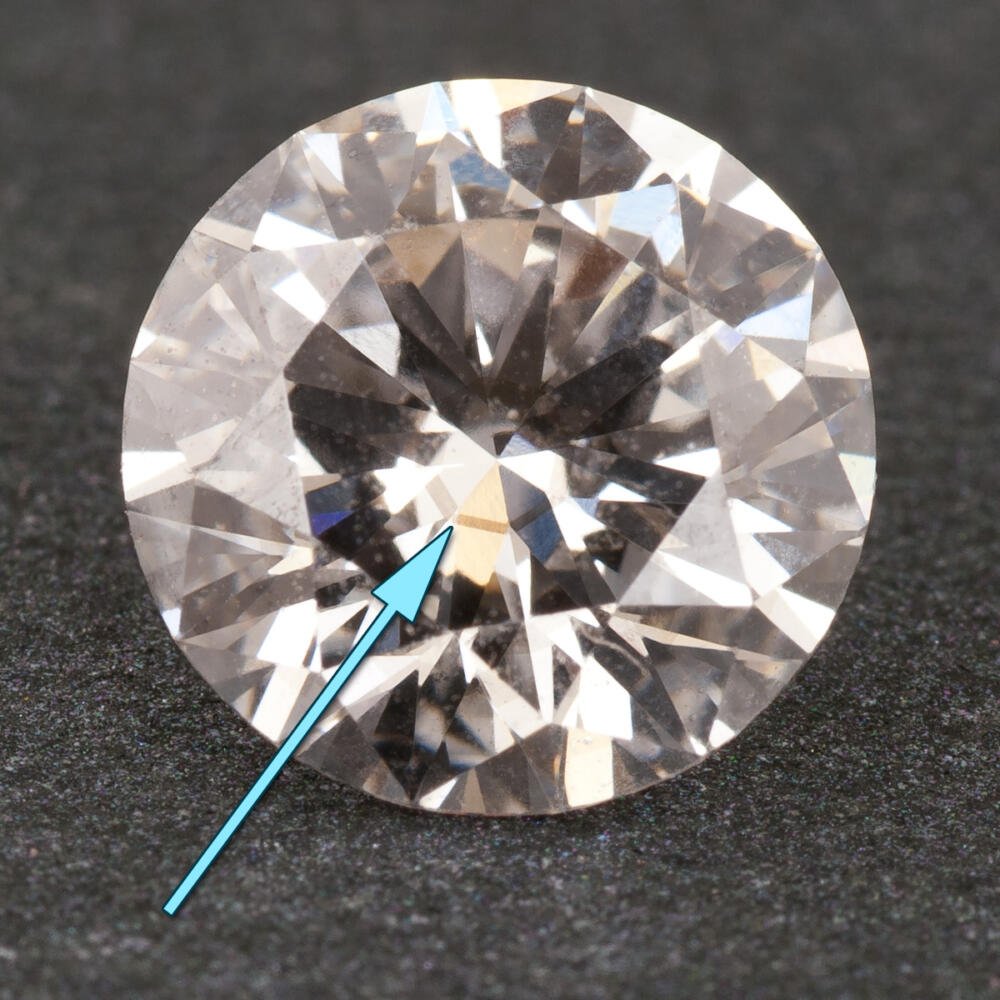How to Tell If a Diamond Is Natural or Lab Grown : Identifying Man-made ...